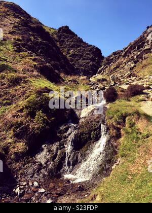 A waterfall in the Carding Mill Valley and the Shropshire Hills ...