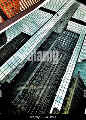 Vertical The shiny windows of office building downtown Stock Photo - Alamy