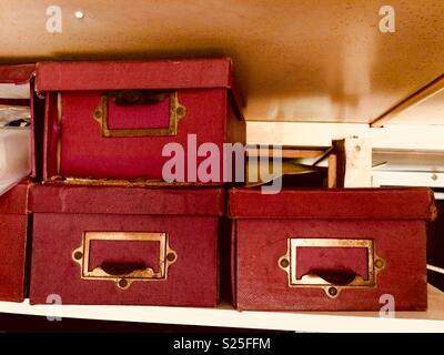 Old box files on a shelf Stock Photo - Alamy