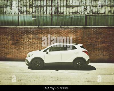 Opel Mokka SUV car side view isolated on white background Stock Photo ...