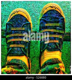 Worn out tennis shoes Stock Photo - Alamy