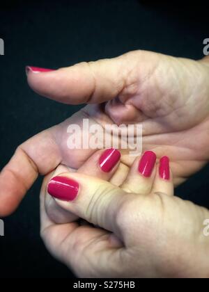 Cracking Knuckles, Female Stock Photo - Alamy