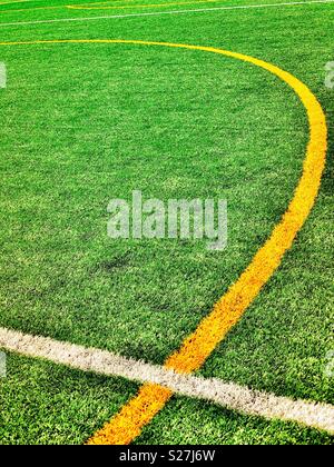 White markings of an artificial turf football field Stock Photo - Alamy