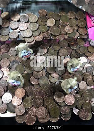 Coin pusher gambling machine Stock Photo - Alamy