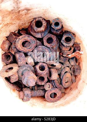 bucket of nuts and bolts Stock Photo - Alamy