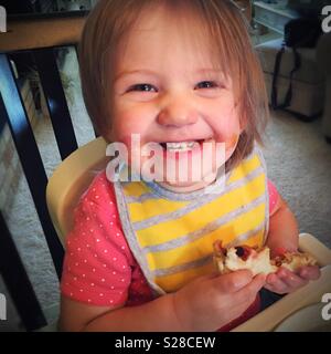 Baby eating peanut butter Stock Photo - Alamy