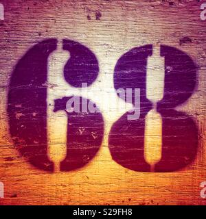 Number sixty-eight (number 68) with red transparent stripe on white ...