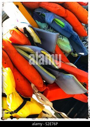 Stack of life jackets Stock Photo - Alamy