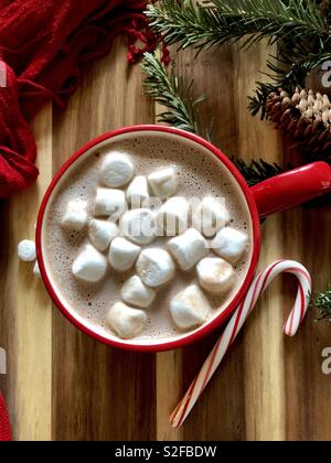 Hot drink with marshmallows on table Stock Photo - Alamy
