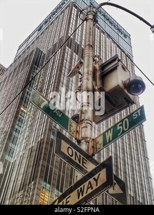 Street signs and NYPD security Camera notice at 42nd Street and Park ...