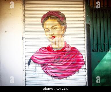 Street art mural of Frida Kahlo in the Hispanic neighborhood of Pilsen ...
