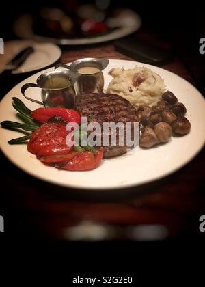 filet Steak with potatoes and mushrooms Stock Photo - Alamy