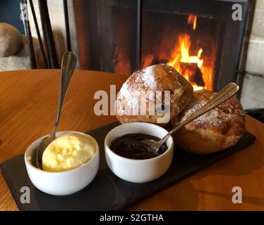 A roaring fire in a traditional English pub at Christmas, the Red Lyon ...