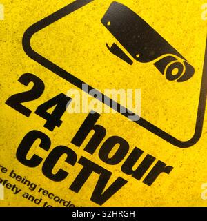 Yellow 24 hr CCTV camera surveillance sign installed bu Micro Vision ...