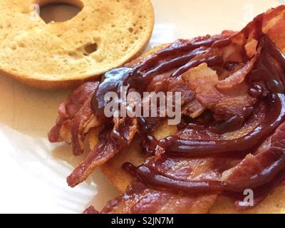 Homemade British Bacon Sandwich on a rustic wooden board, side view ...