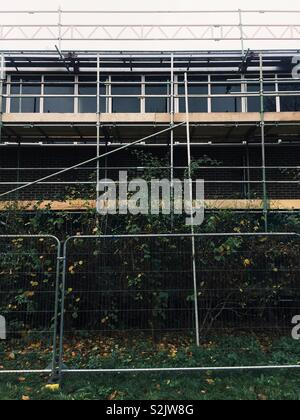 Fence around the construction site. Fenced abandoned area. Steel fence ...
