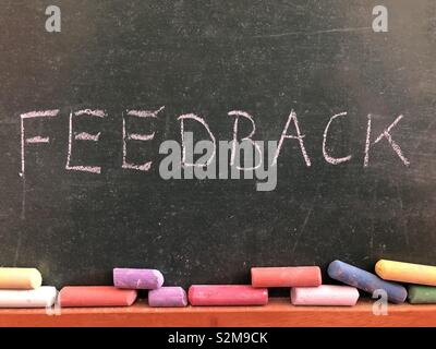 Chalkboard with writing Feedback Stock Photo - Alamy