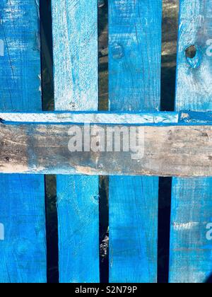 Wooden pallet painted blue Stock Photo - Alamy