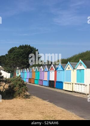 Colourful beach huts at Avon Beach, Dorset UK Stock Photo - Alamy