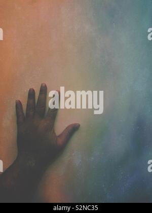 Man’s hand against wall Stock Photo - Alamy