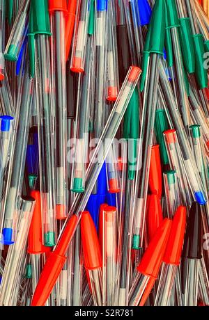 Red, green and blue ballpoint pens on white background Stock Photo - Alamy