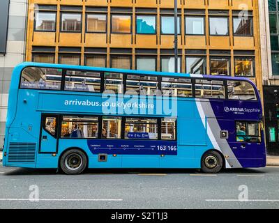 bus and passengers at Leeds city bus station Yorkshire UK Stock Photo ...