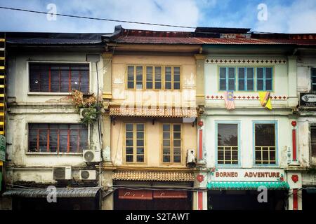 The colourful façades of terraced shophouses in the old Main Bazaar at ...