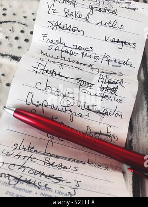 Grocery list and ball point pen close up, USA Stock Photo - Alamy