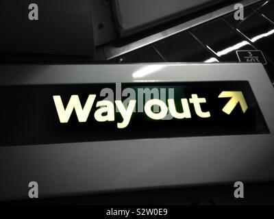 Way Out symbol from a subway in London, UK Stock Photo - Alamy
