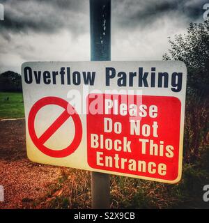 Overflow parking traffic warning sign Stock Photo - Alamy