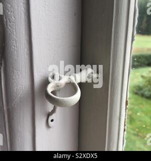 Old window catch Stock Photo - Alamy