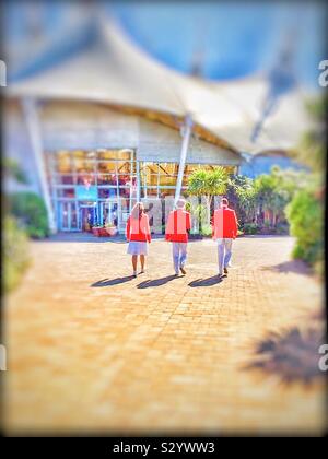 Trio of red coats at Butlins Bognor Regis summer 2019 outside skyline ...