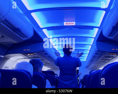 Aer Lingus cabin crew safety demonstration with oxygen mask Stock Photo ...