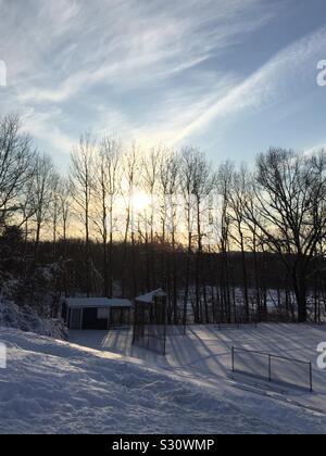 Snow Covered Baseball Field In Winter Stock Photo - Alamy