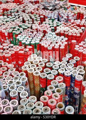 Rolls of Christmas wrapping paper in a Lidl shopping cart outside the ...