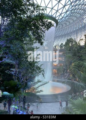 Waterfall at Jewel Changi Airport shopping mall at Singapore airport ...