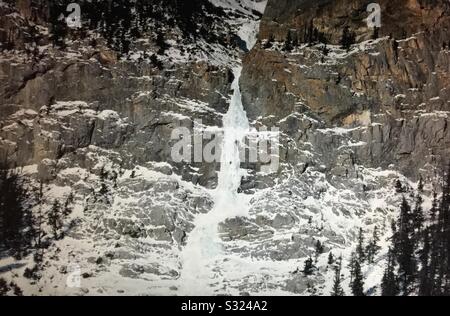 Ice falls, climber, Cascade Mountain and Falls,Canadian Rockies, Banff National Park, Alberta ...