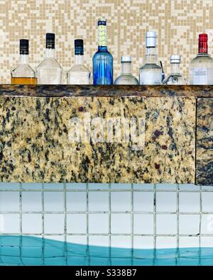 Mexico Cancun pool and swim up bar with palapas on beach Stock Photo ...