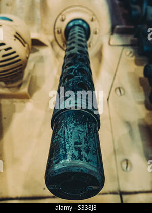 Tank gun, barrel muzzle of a military army close-up. Broken burnt tank ...