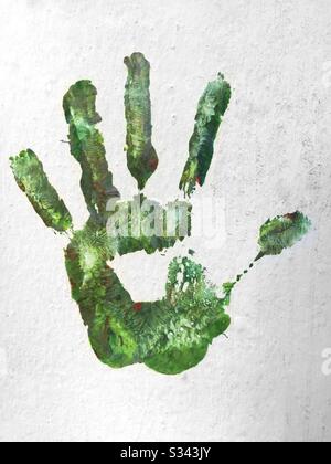 One green handprint Stock Photo - Alamy