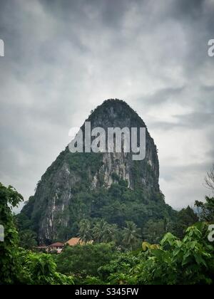 Gunung Reng, a limestone outcrop near Jeli, Kelantan, Malaysia Stock ...