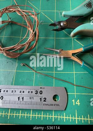 Hand bending a ruler Stock Photo - Alamy