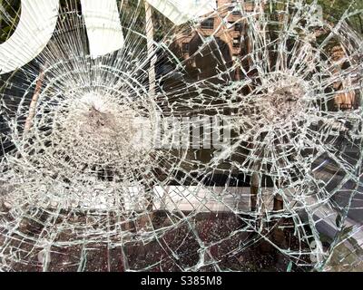 Shattered store window, close-up Stock Photo - Alamy