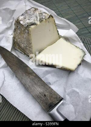French pyramid shaped goat’s cheese and citrus fruit Stock Photo - Alamy