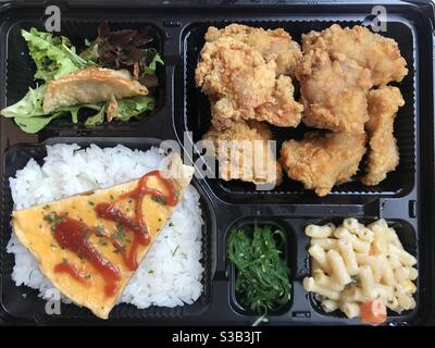 Korean fried chicken bento box Stock Photo - Alamy