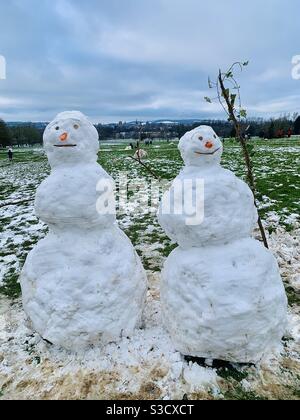 Couple of snowmen Stock Photo - Alamy