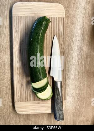Chopped Courgette on Chopping Board Stock Photo - Alamy
