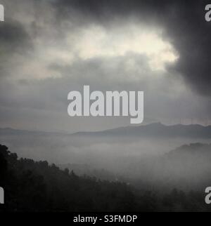 View of foggy mountains Stock Photo - Alamy