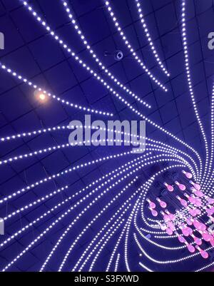 Decorative blue neon lights in the darkness Stock Photo - Alamy