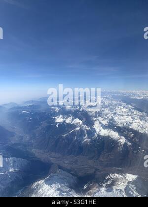 View of the Alps from the window of a British Airways flight over ...